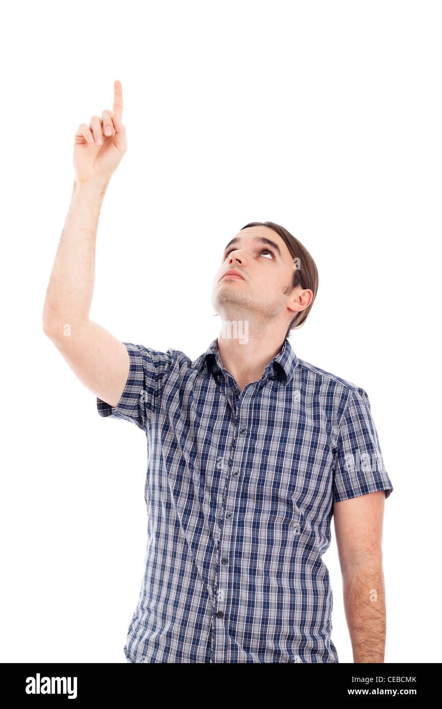 Young serious man pointing up, isolated on white background Stock Photo ...