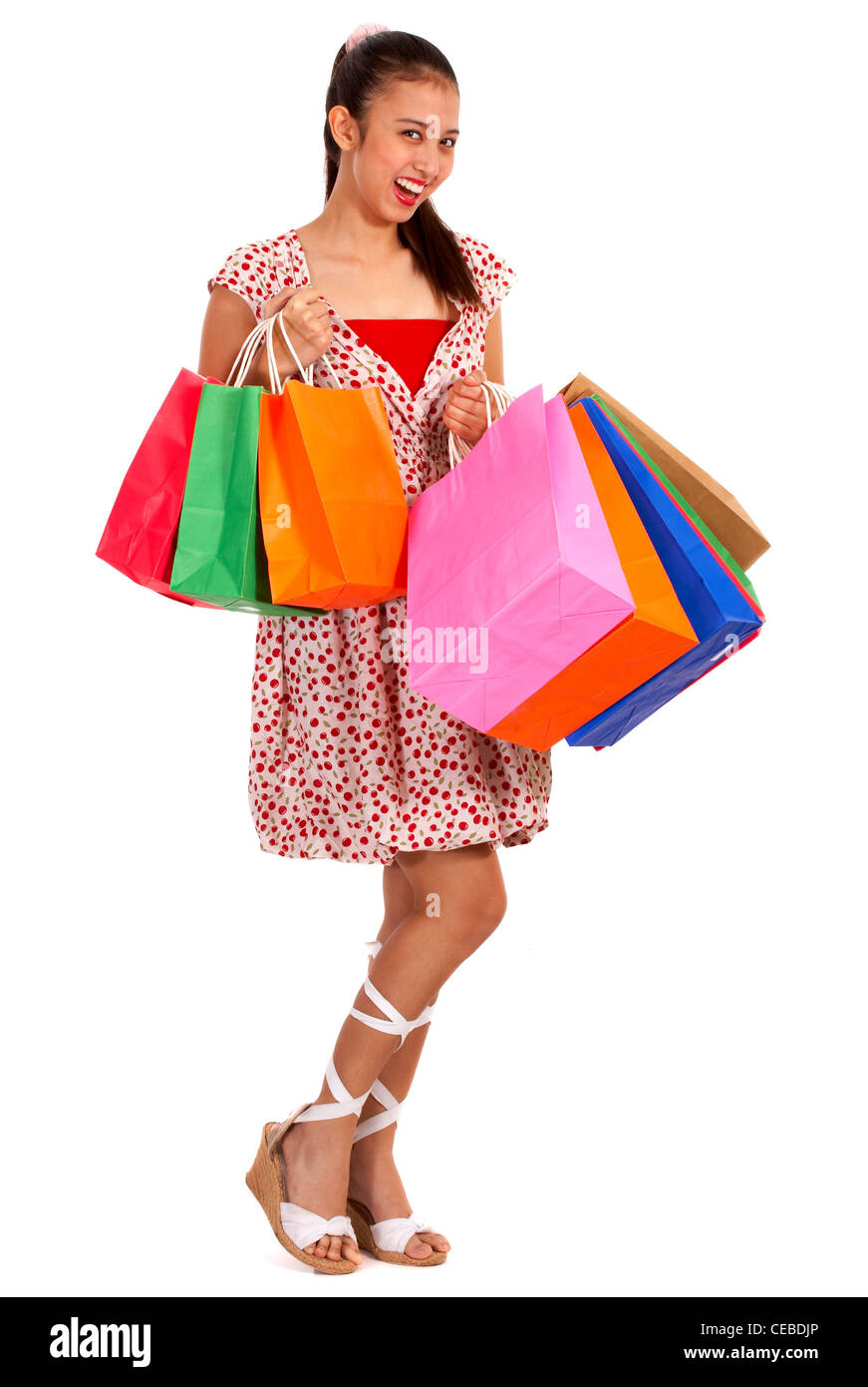 Happy Smiling Girl With Many Bags Full Of Purchases Stock Photo - Alamy