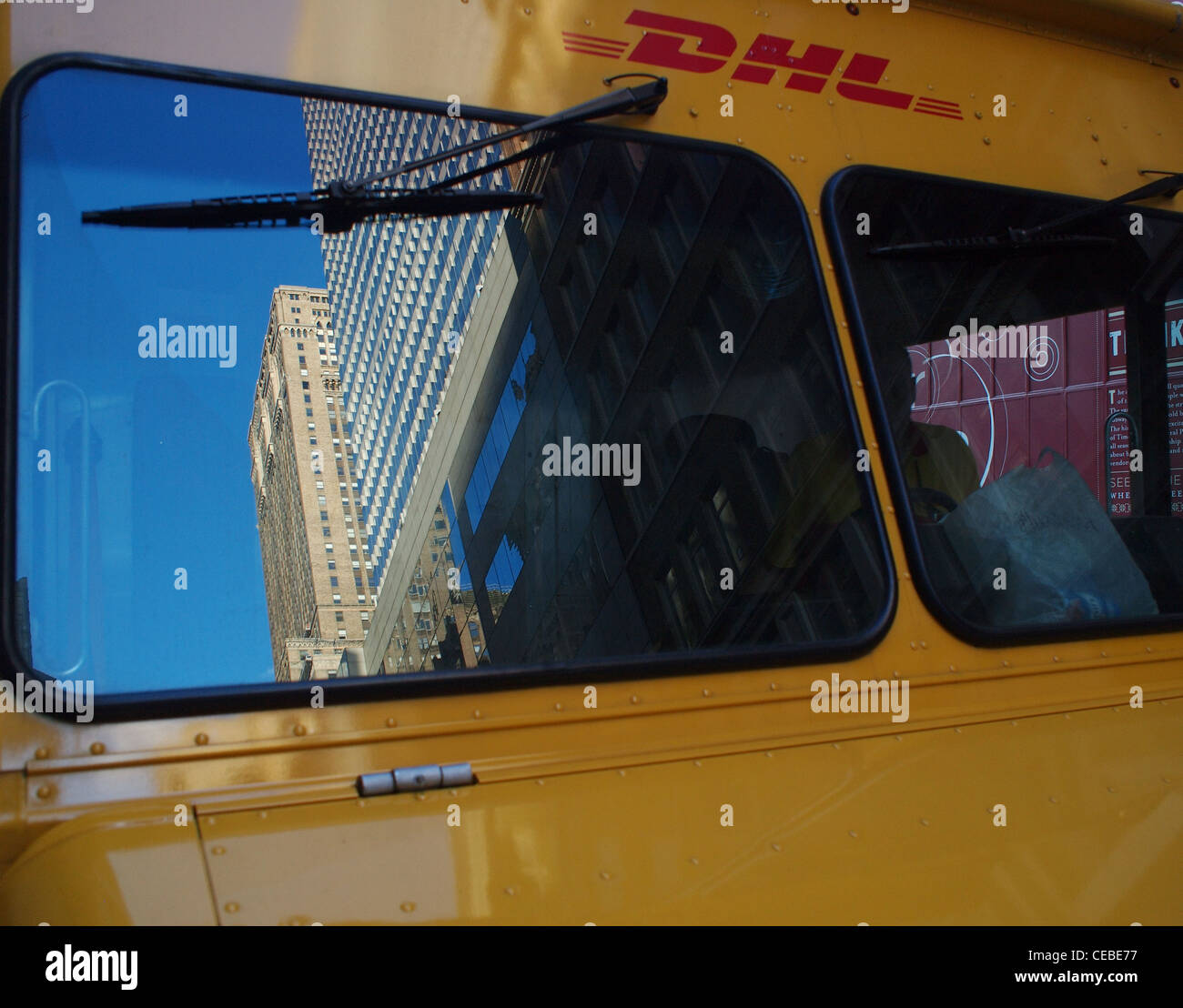 Reflection in window of commercial truck, New York Stock Photo - Alamy