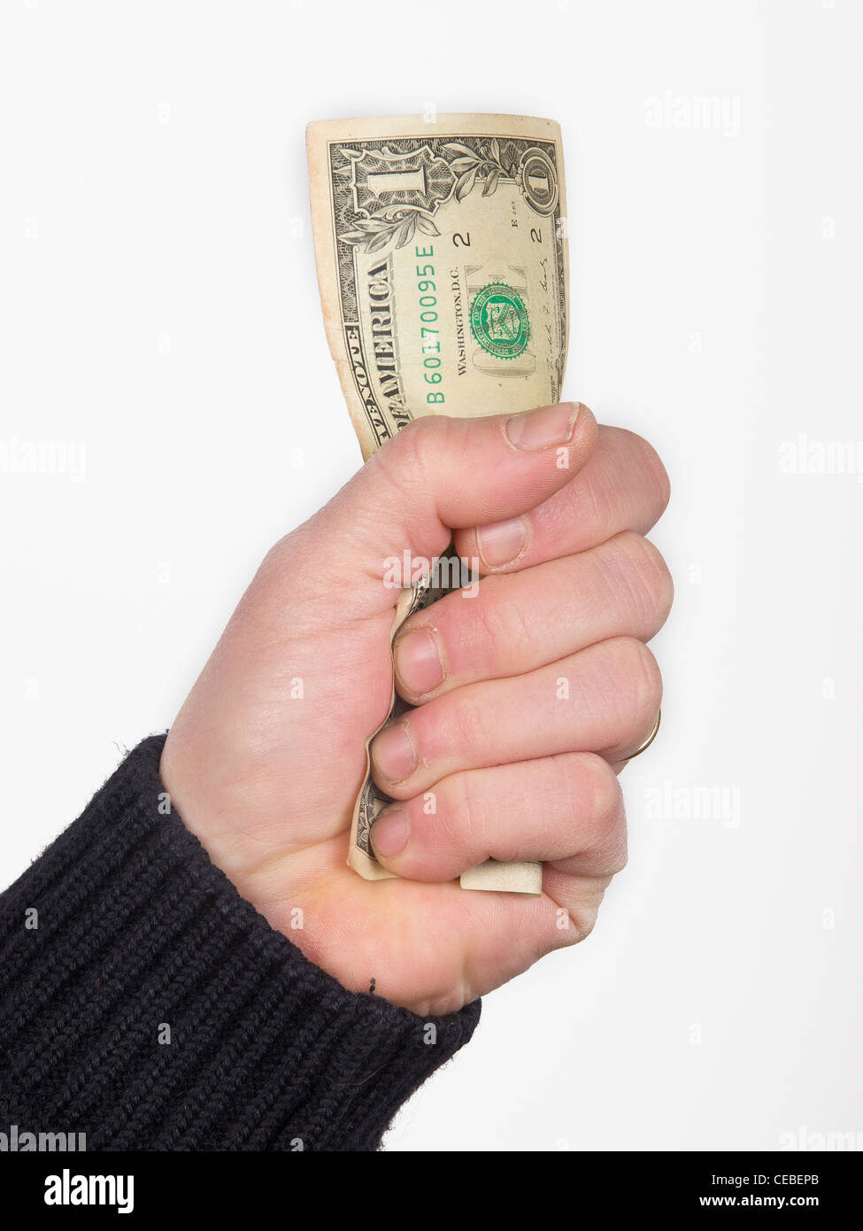 one american dollar in a fist Stock Photo - Alamy