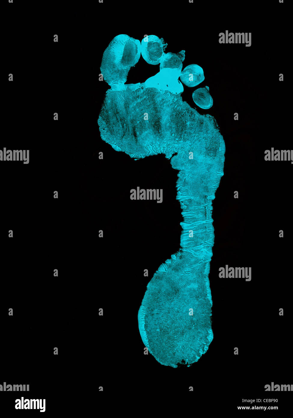 A colored footprint on a black background Stock Photo - Alamy