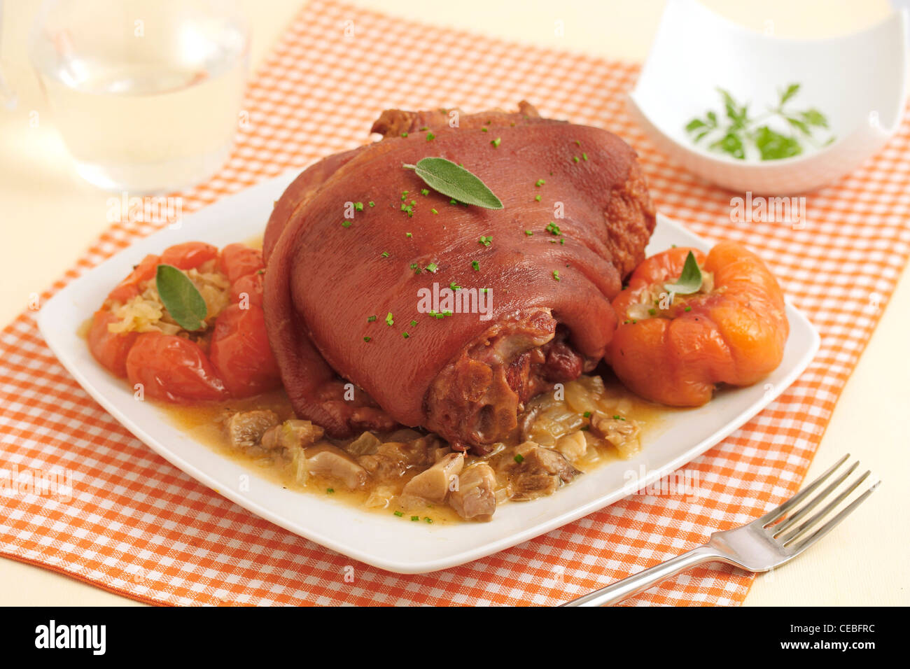 Smoked knuckle with mushrooms and peppers. Recipe available Stock Photo ...