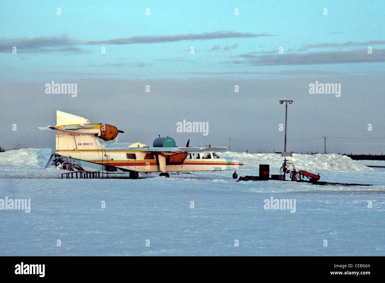 Airplane in the snow Stock Photo - Alamy