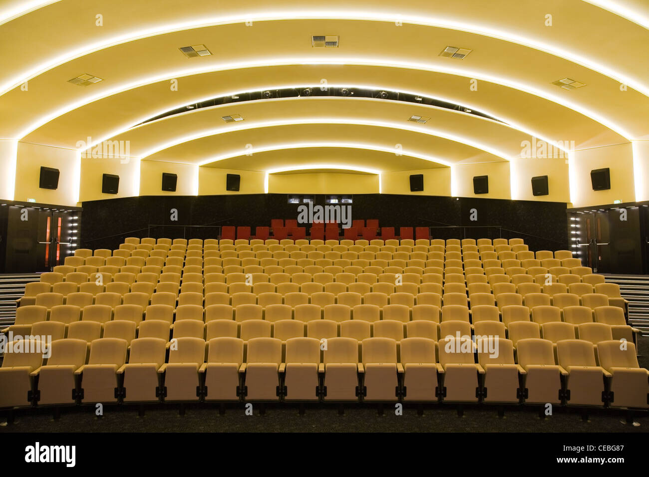 Empty cinema auditorium with line of chairs. Front view Stock Photo - Alamy