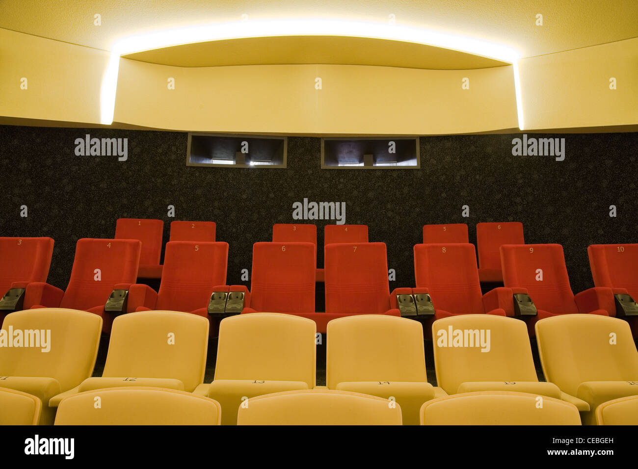 Empty cinema auditorium with line of chairs. Front view Stock Photo - Alamy