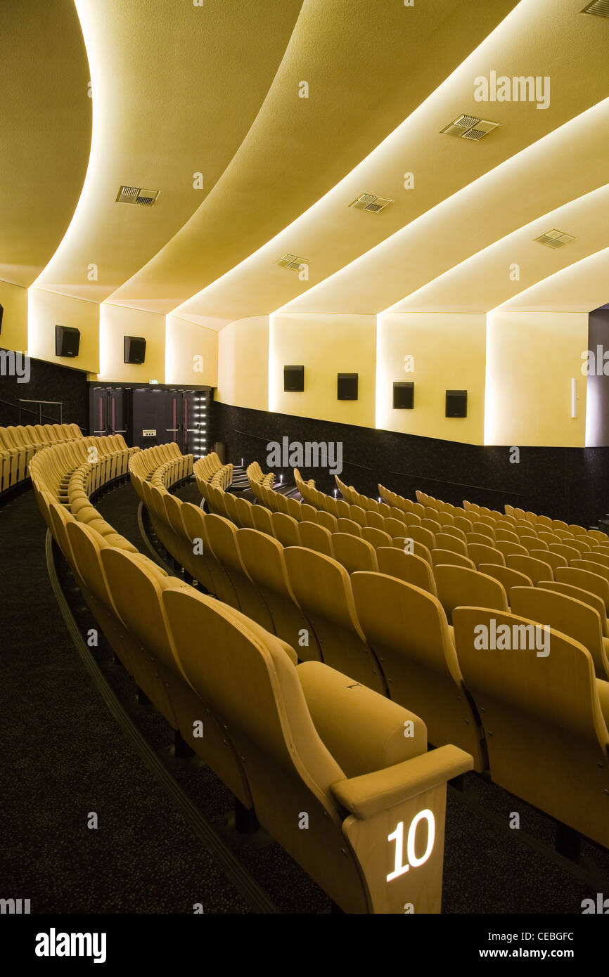 Empty cinema auditorium with line of chairs. Row number 10 Stock Photo ...