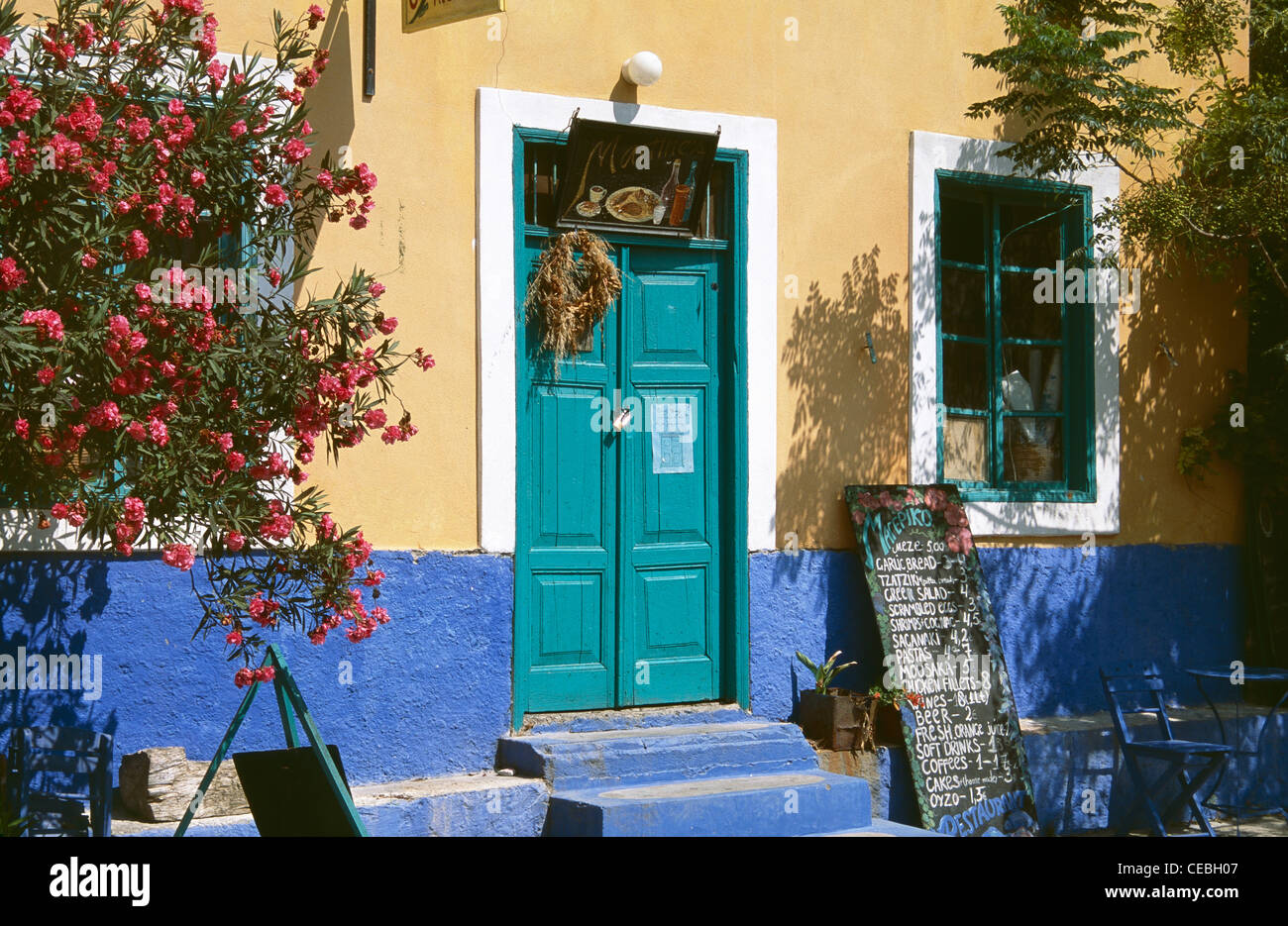 Colourful Taverna doorway on Rhodes, Greece, showing menu board Stock ...