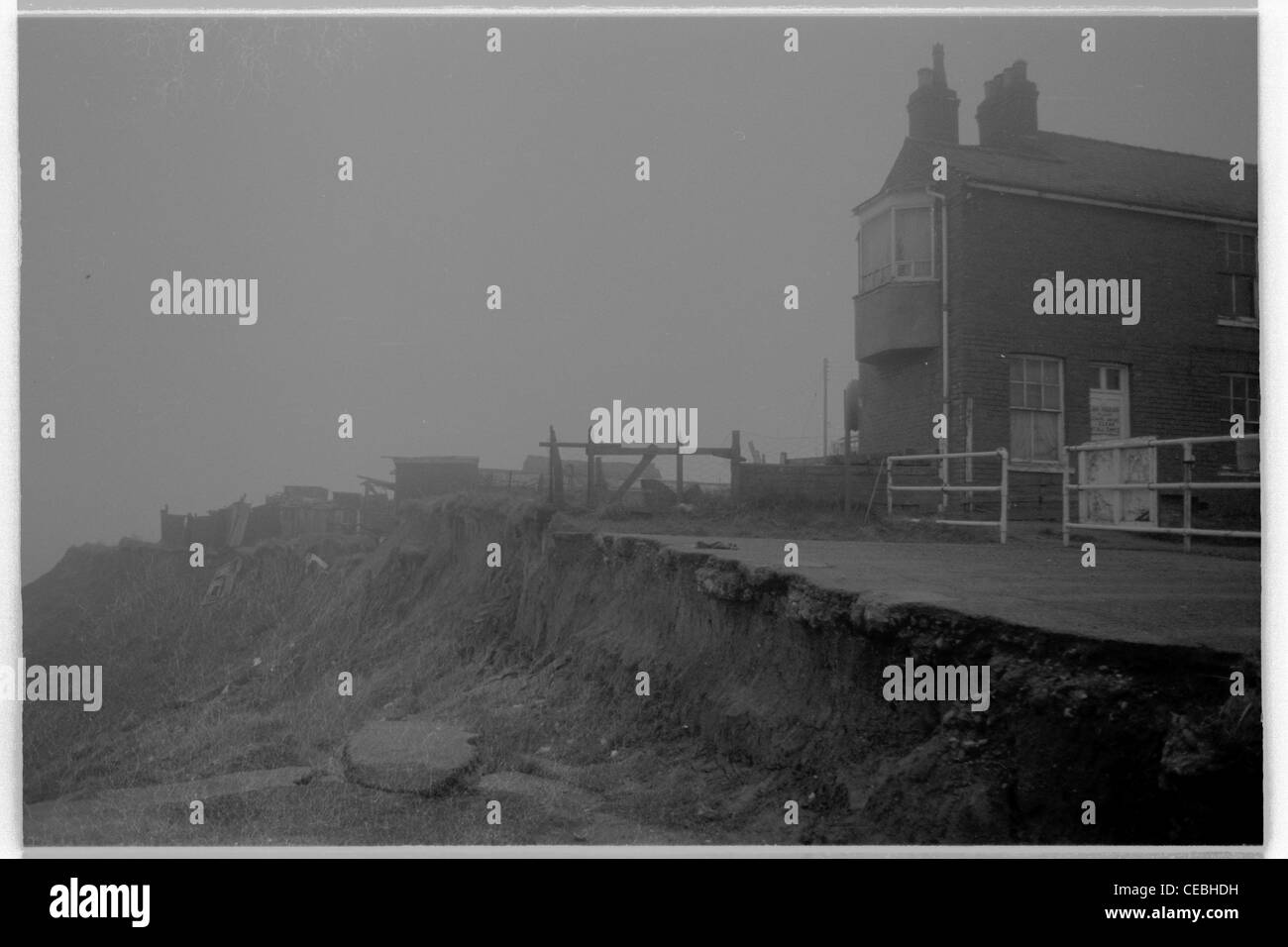 View of a house at Atwick suffering from coastal erosion on the east ...