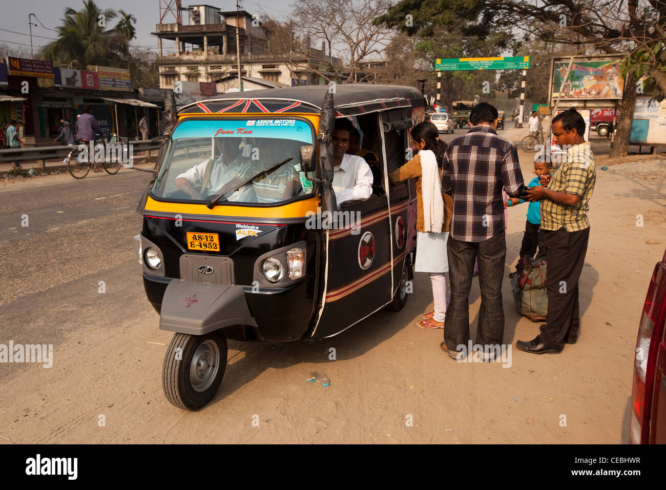N9034 India, Assam, Tezpur, transport, family boarding already crowded ...