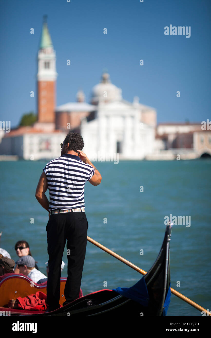 Gondolier at work in front of San Giorgio Maggiore, Venice, Italy Stock ...