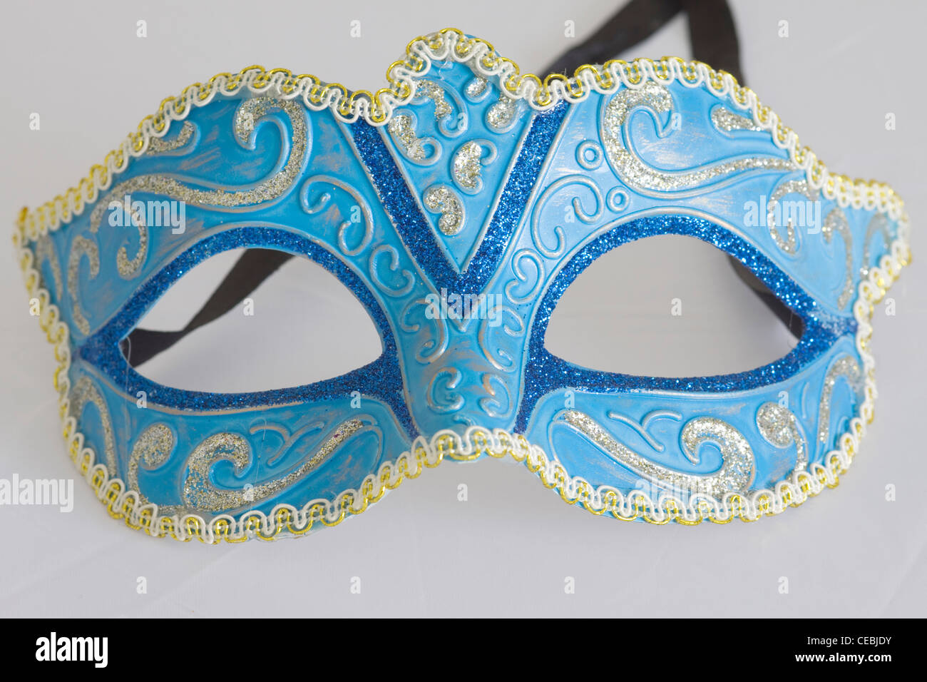 Venetian face mask on white Stock Photo - Alamy