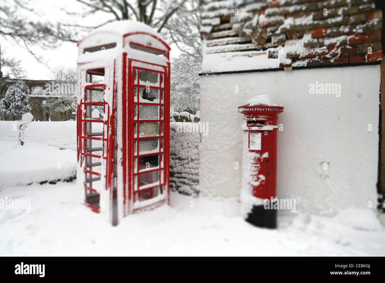 A British red phone box is covered in snow in the freezing British ...
