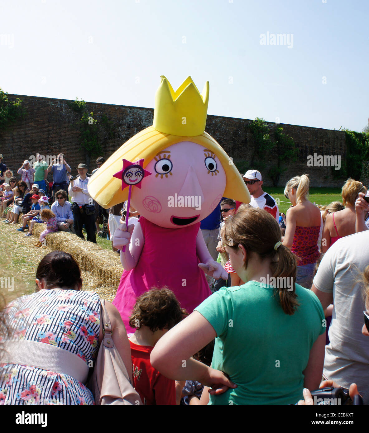 Childrens television characters meet children in a park hi-res stock ...