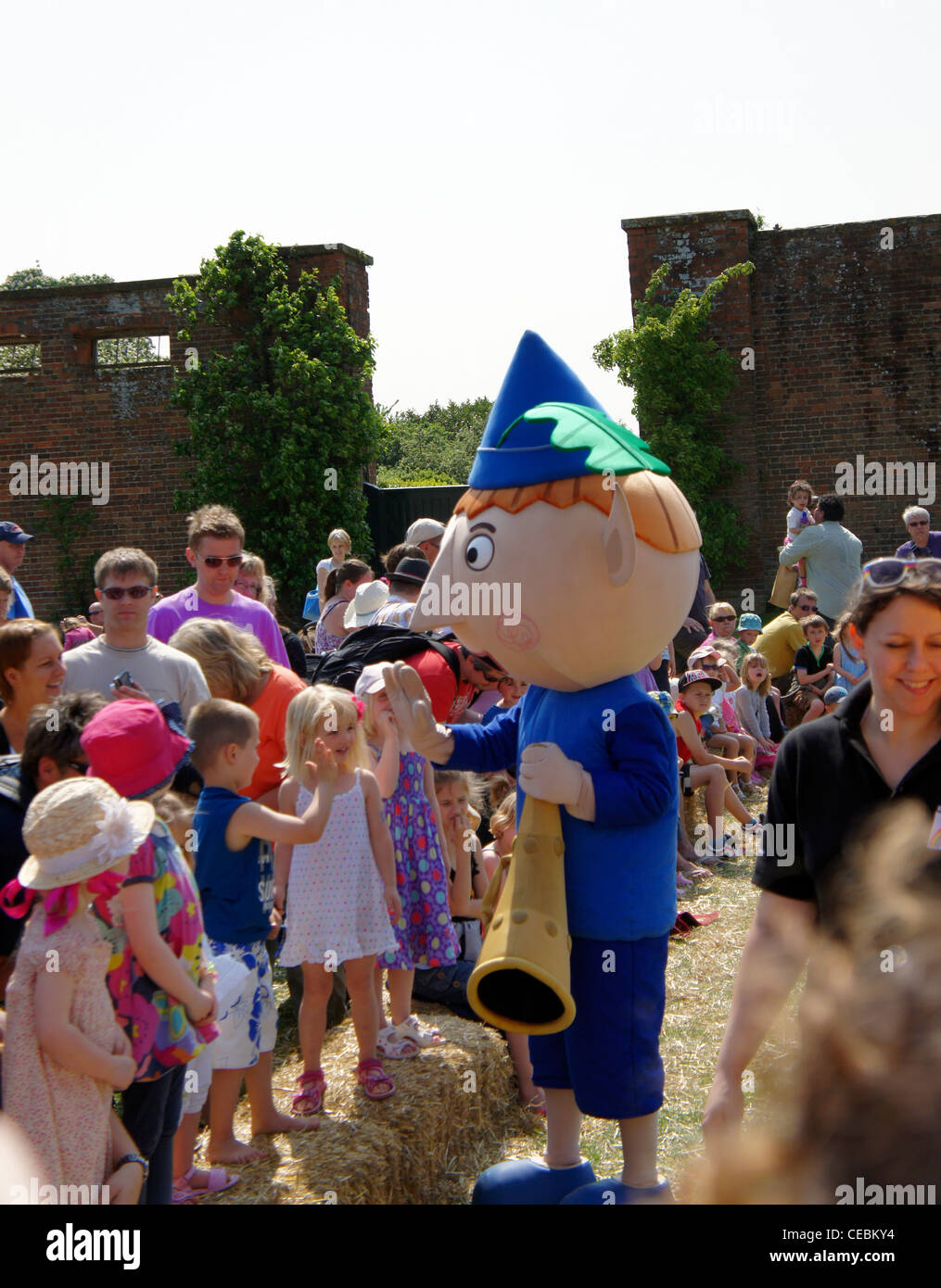 Childrens television characters meet children in a park hi-res stock ...