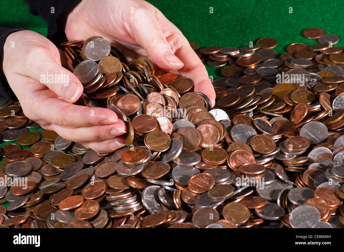 a large pile of assorted US coins Stock Photo - Alamy