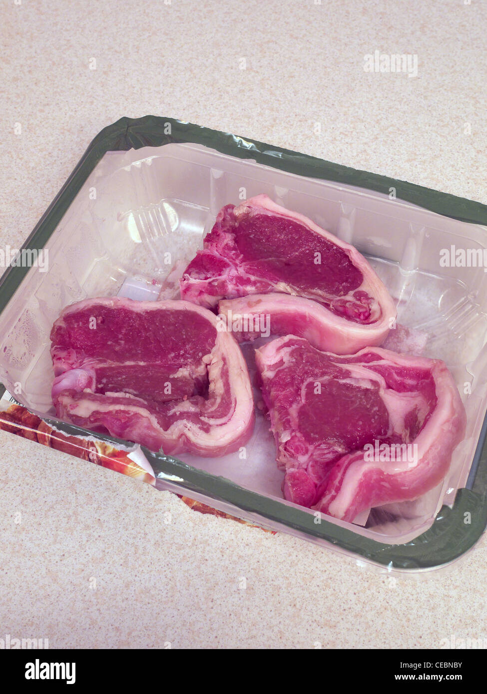 Three Raw Lamb Chops or Cutlets in a Plastic Packaging Tray Stock Photo ...