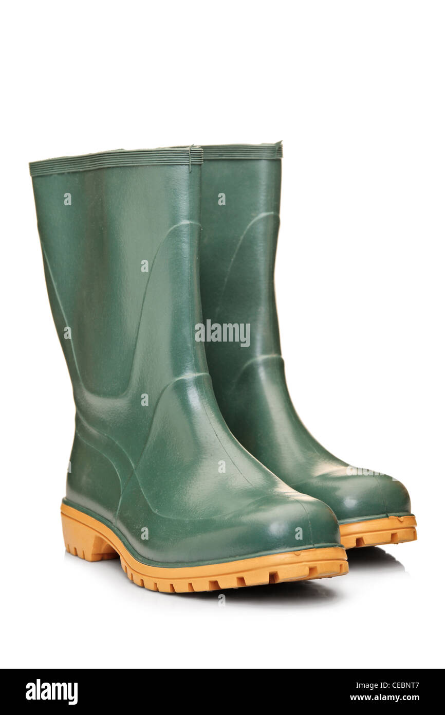 A studio shot of a green rubber boots isolated on white background ...