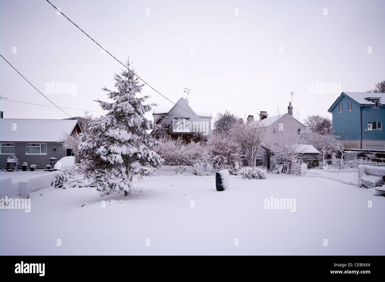 Snow Covered Houses and Gardens After Heavy Snowfall In The Winter ...