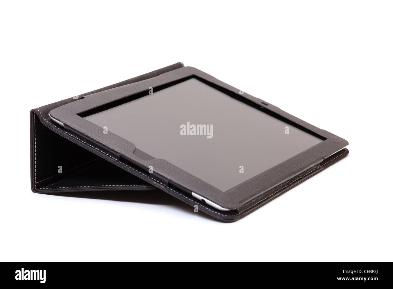 Internet tablet in black leather cover on white background Stock Photo ...