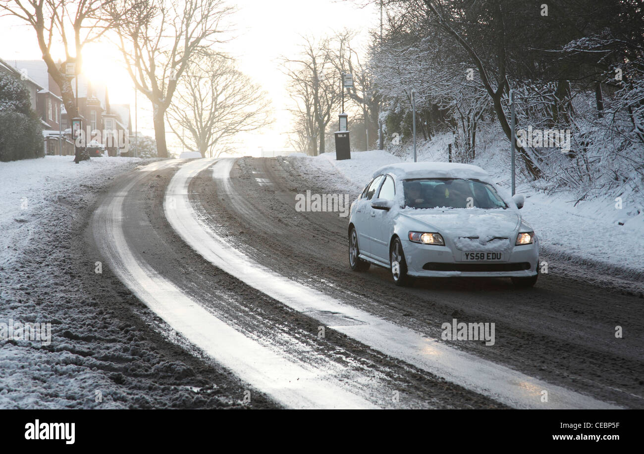 Treacherous winter driving conditions on a road in the U.K Stock Photo ...