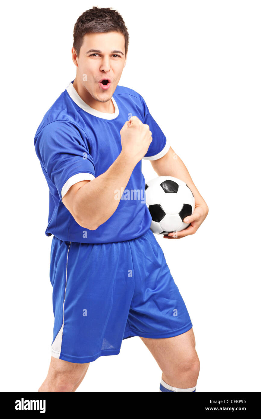 Excited sport fan holding a football and gesturing isolated on white ...