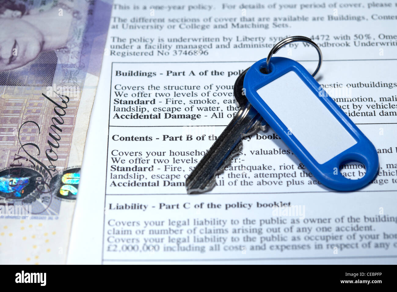 uk house and contents building insurance policy with house key and cash ...