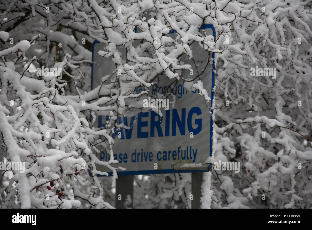 Snow covered London borough of Havering sign Stock Photo - Alamy