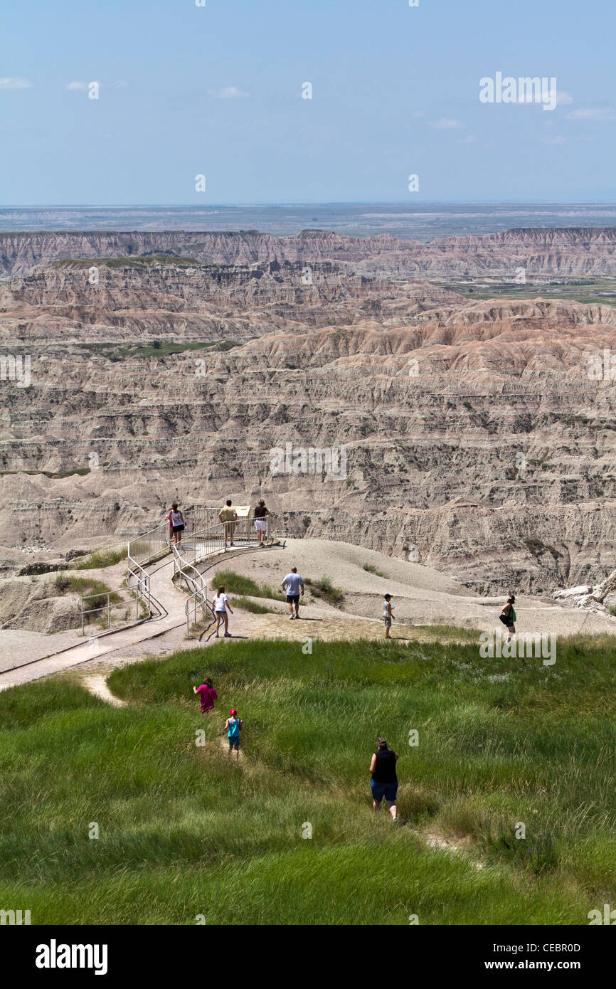 The tourists are in the mountains valley American Badlands Mounds ...