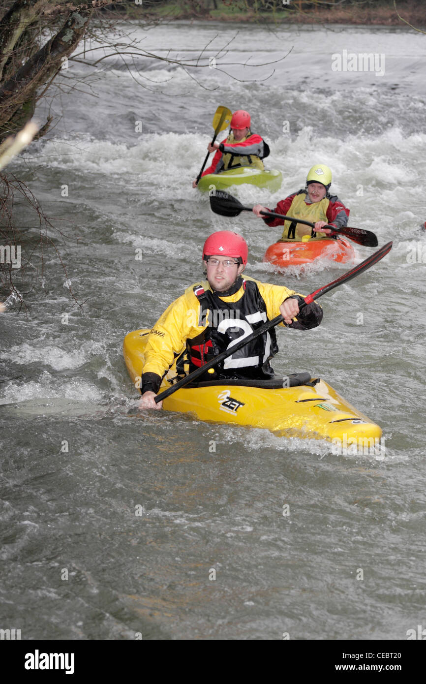 male man canoeist taking part in inter university competition on River ...