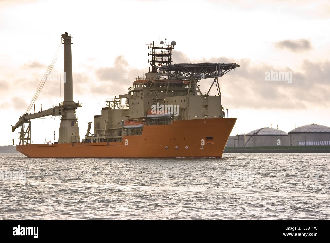 Diving support and offshore construction vessel leaving port in the ...
