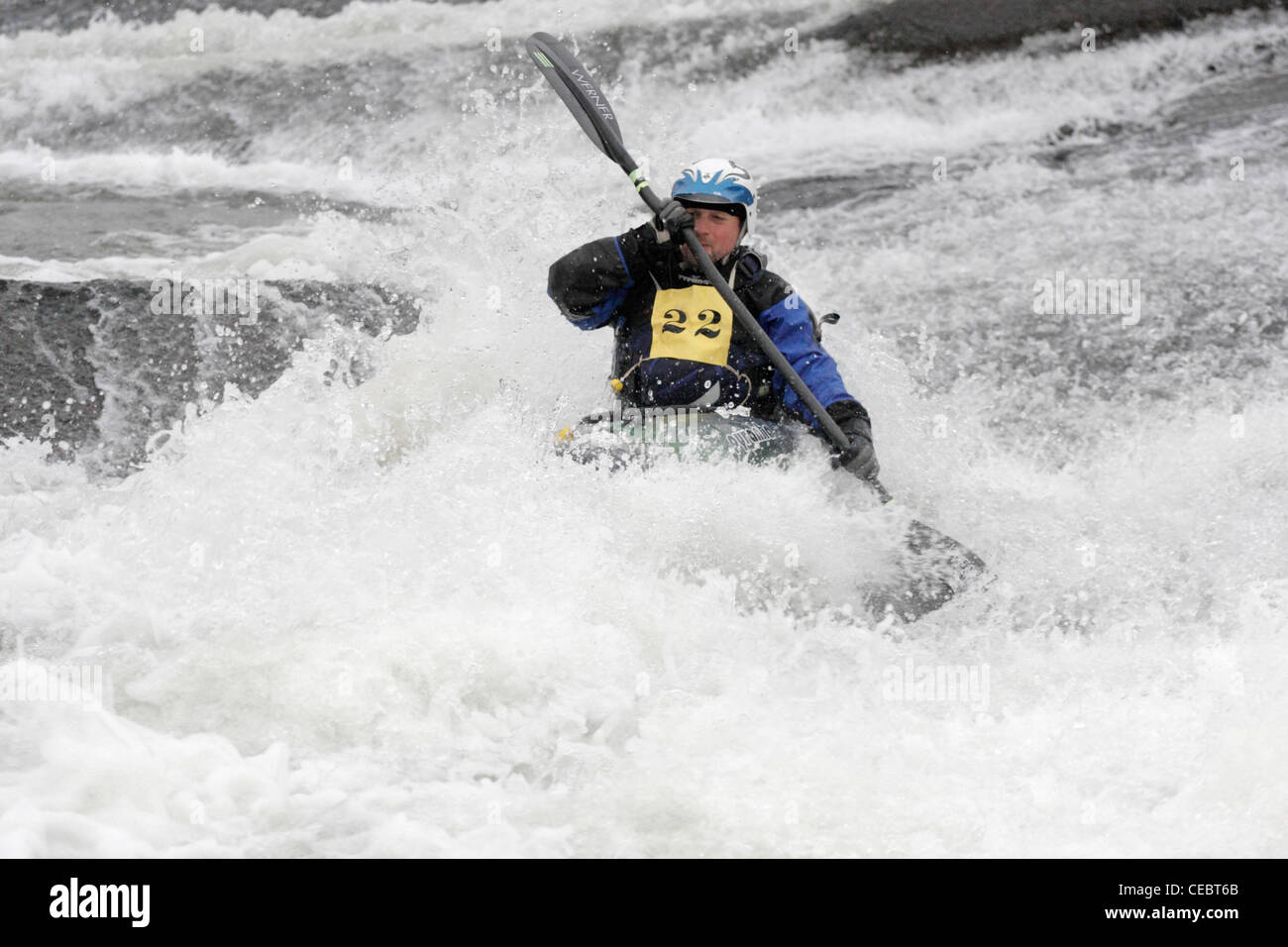 male man canoeist taking part in inter university competition on River ...