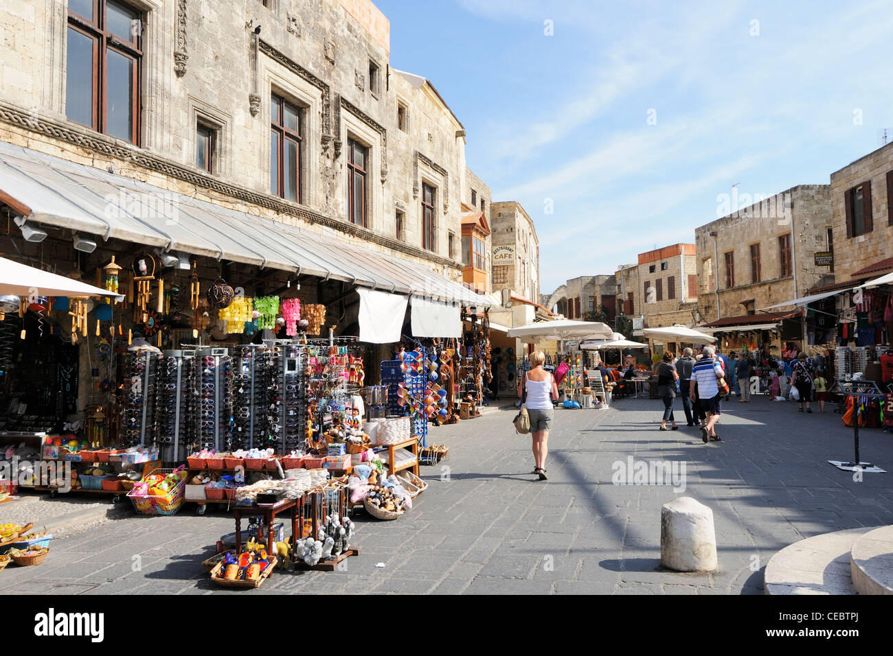 Shoppers walking around the shops in Rhodes Old Town Stock Photo - Alamy