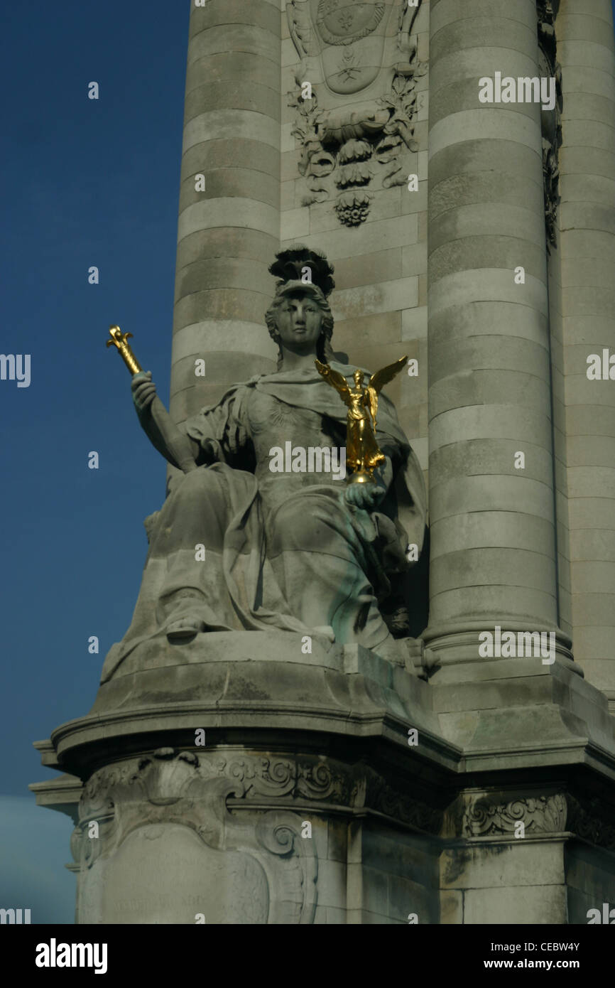 Statue at The Pont Alexandre III bridge Stock Photo - Alamy