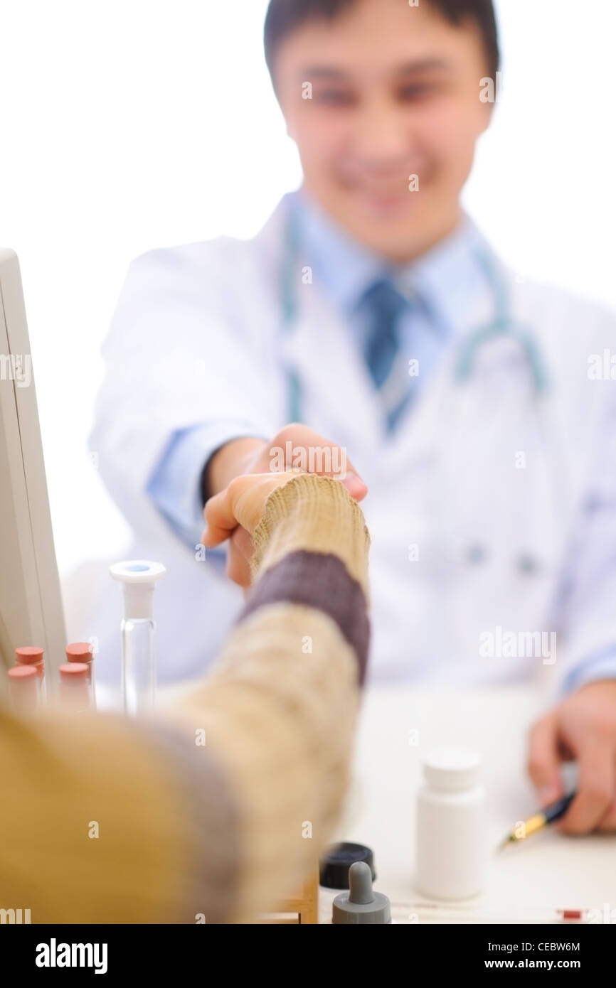 Closeup on handshake of medical doctor and patient Stock Photo - Alamy