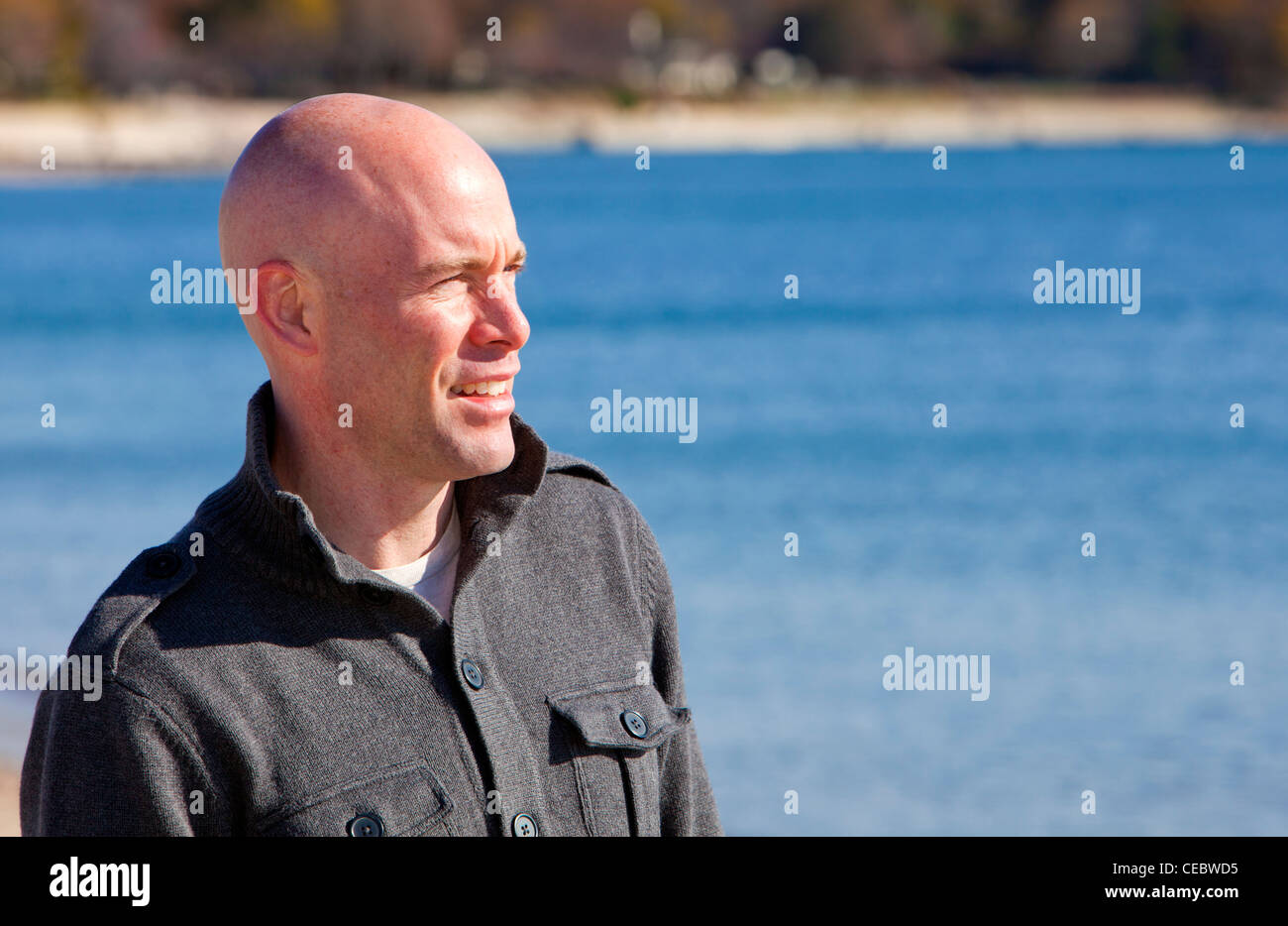 Man in blue sweater on hi-res stock photography and images - Alamy