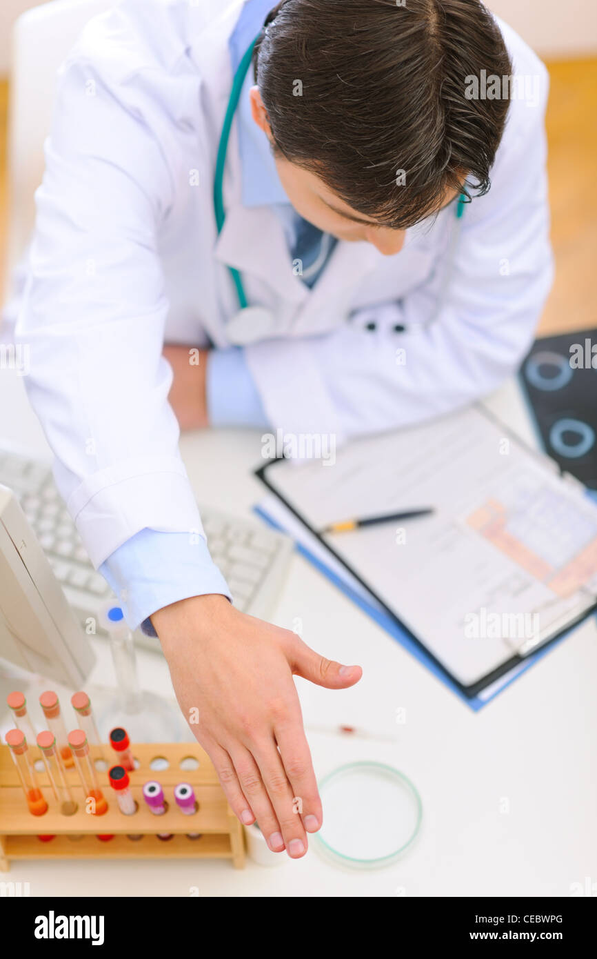 Medical doctor spreading hand for handshake. Top view Stock Photo - Alamy