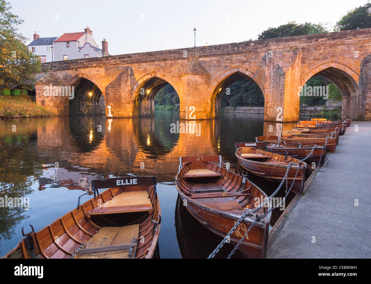 Elvet Bridge over River Wear with reflection and pleasure rowing boats ...