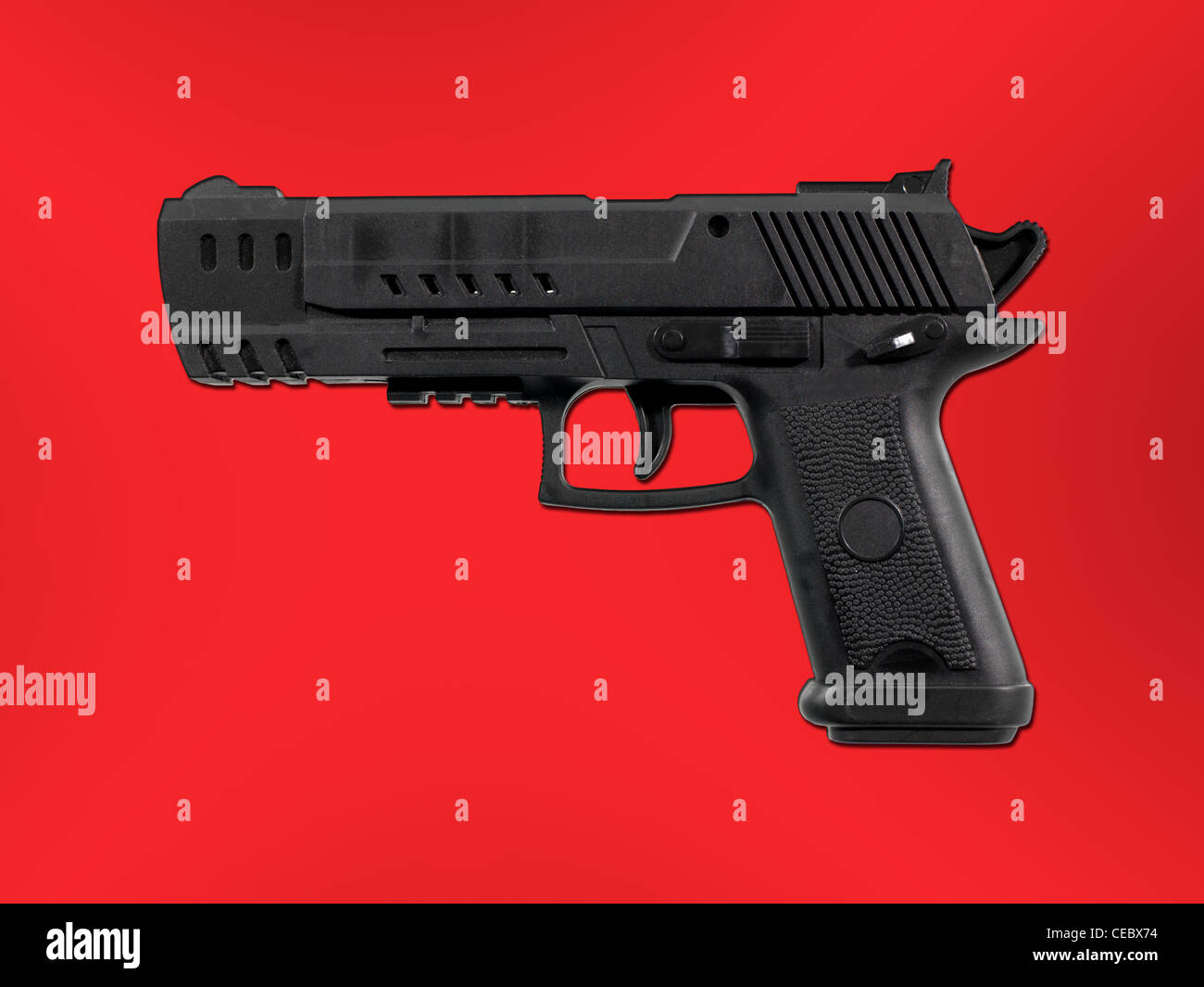 A toy hand gun isolated against a white background Stock Photo - Alamy