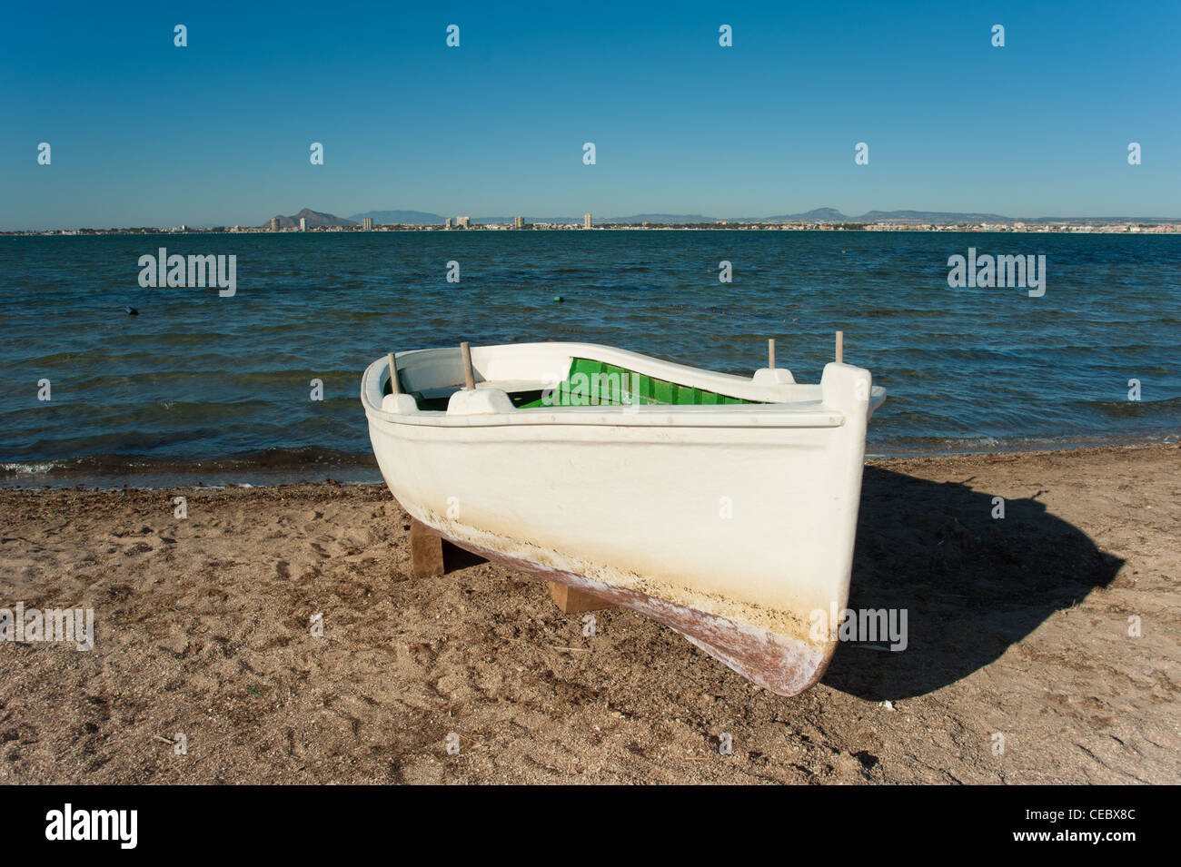 A traditional fishing boat resting on a Mar Menor Beach, Costa Calida ...