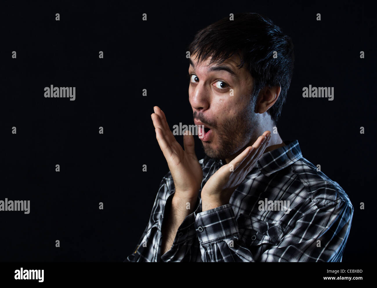 Man Expressing Surprise On Black Stock Photo - Alamy