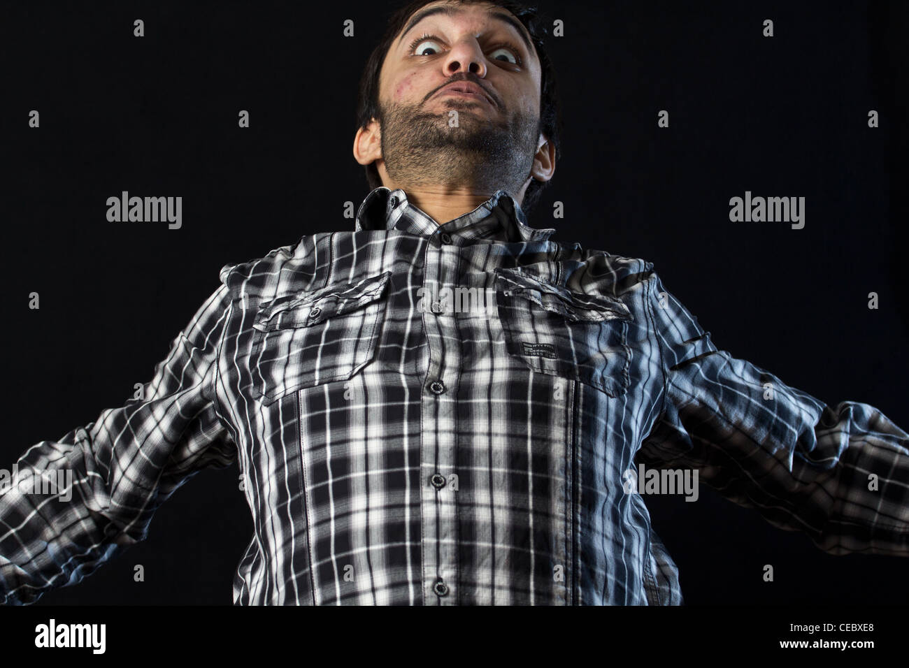 Surprised Looking Falling/Jumping Toward Camera Stock Photo - Alamy