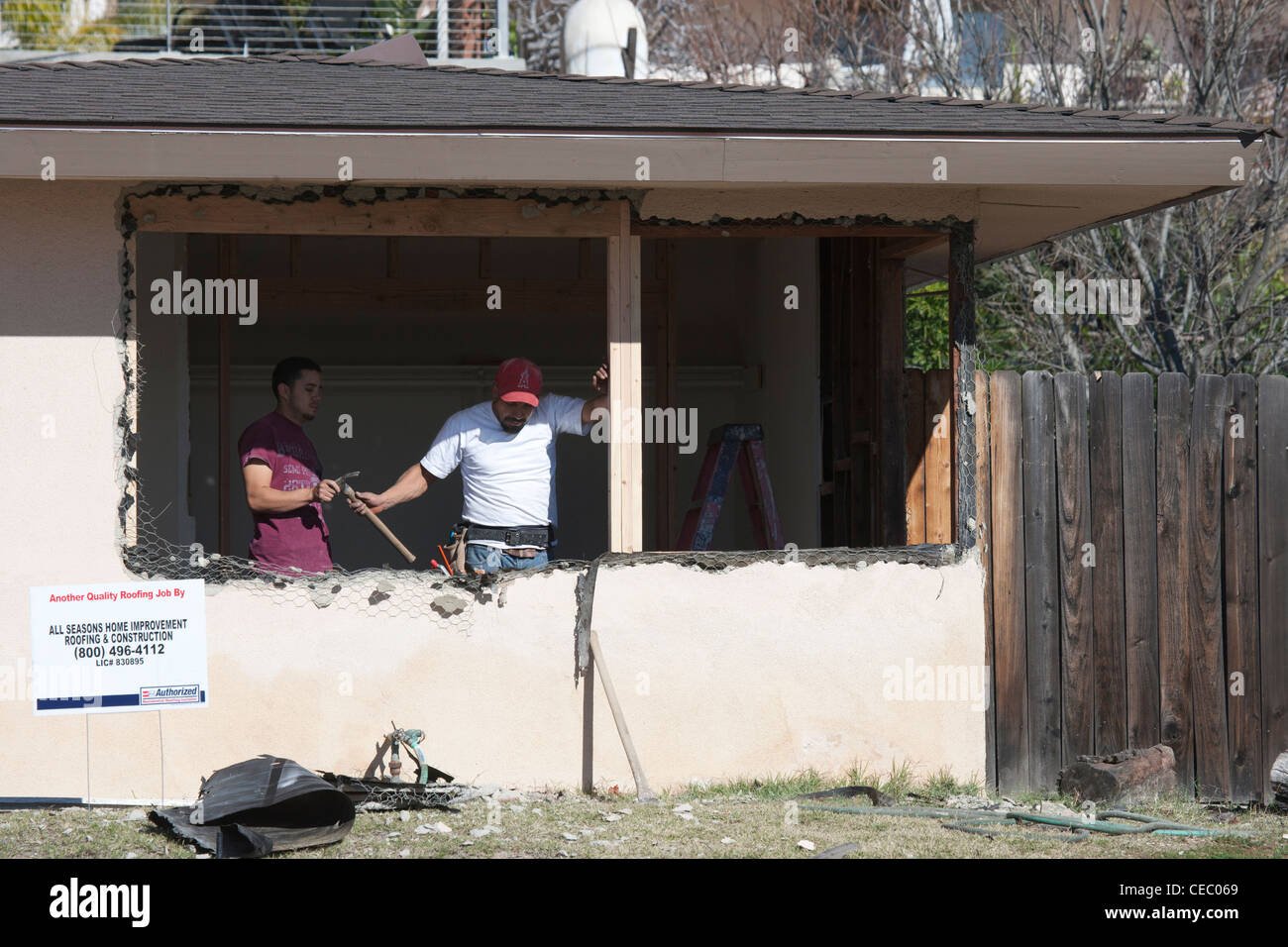 Men Framing New Window Opening in Home Remodel Stock Photo - Alamy