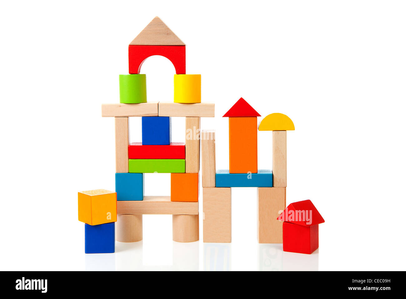 House made out of colorful wooden building blocks over white background ...