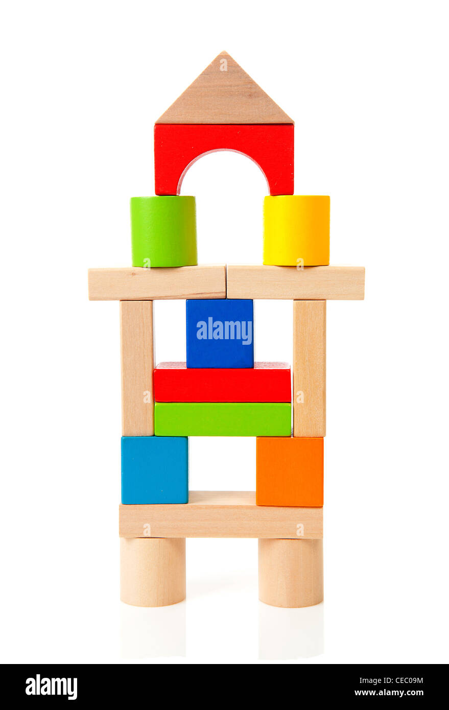 House made out of colorful wooden building blocks over white background ...