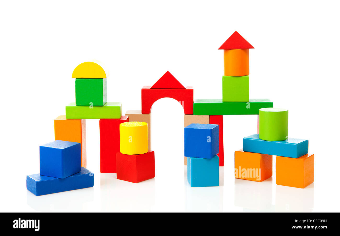 House made out of colorful wooden building blocks over white background ...