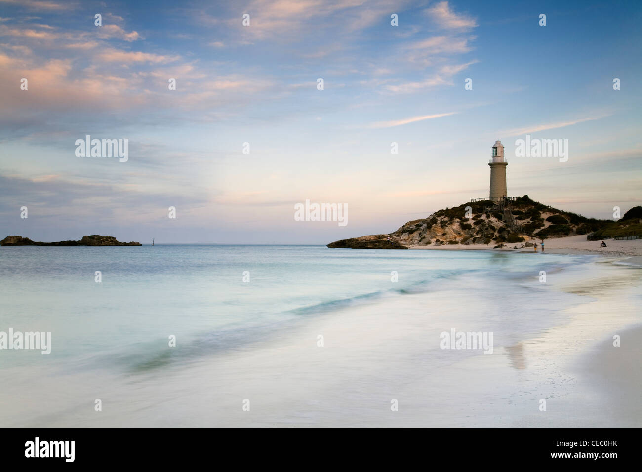 View along Pinky Beach to Bathurst lighthouse at dusk. Rottnest Island ...