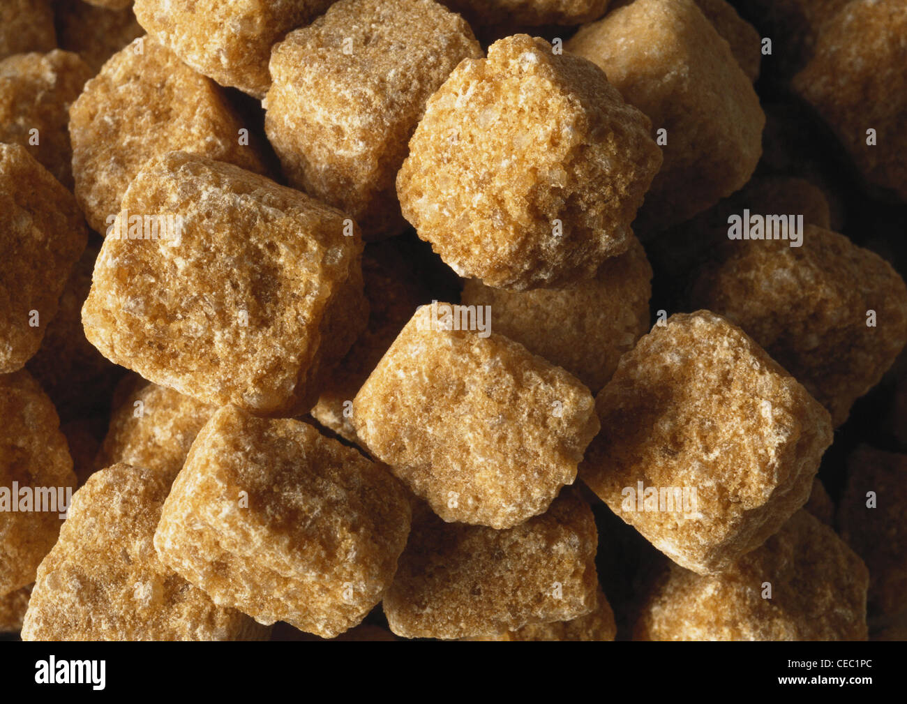 Cane lump sugar, full frame Stock Photo - Alamy