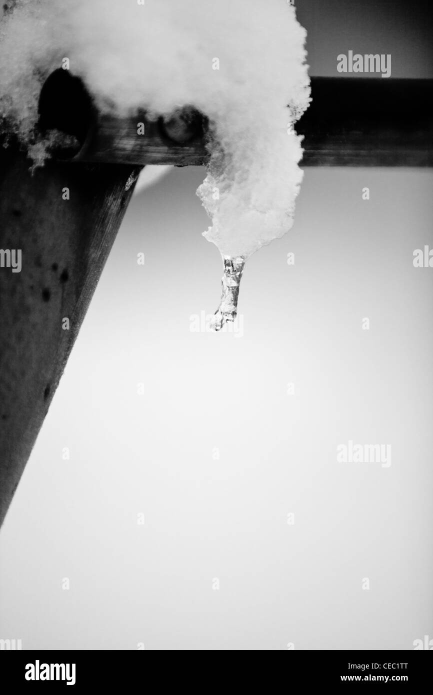 Small Icicle on a Garden Swing Framework Stock Photo - Alamy