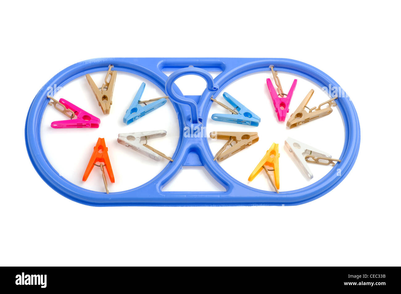 object on white - a set of pegs Stock Photo - Alamy
