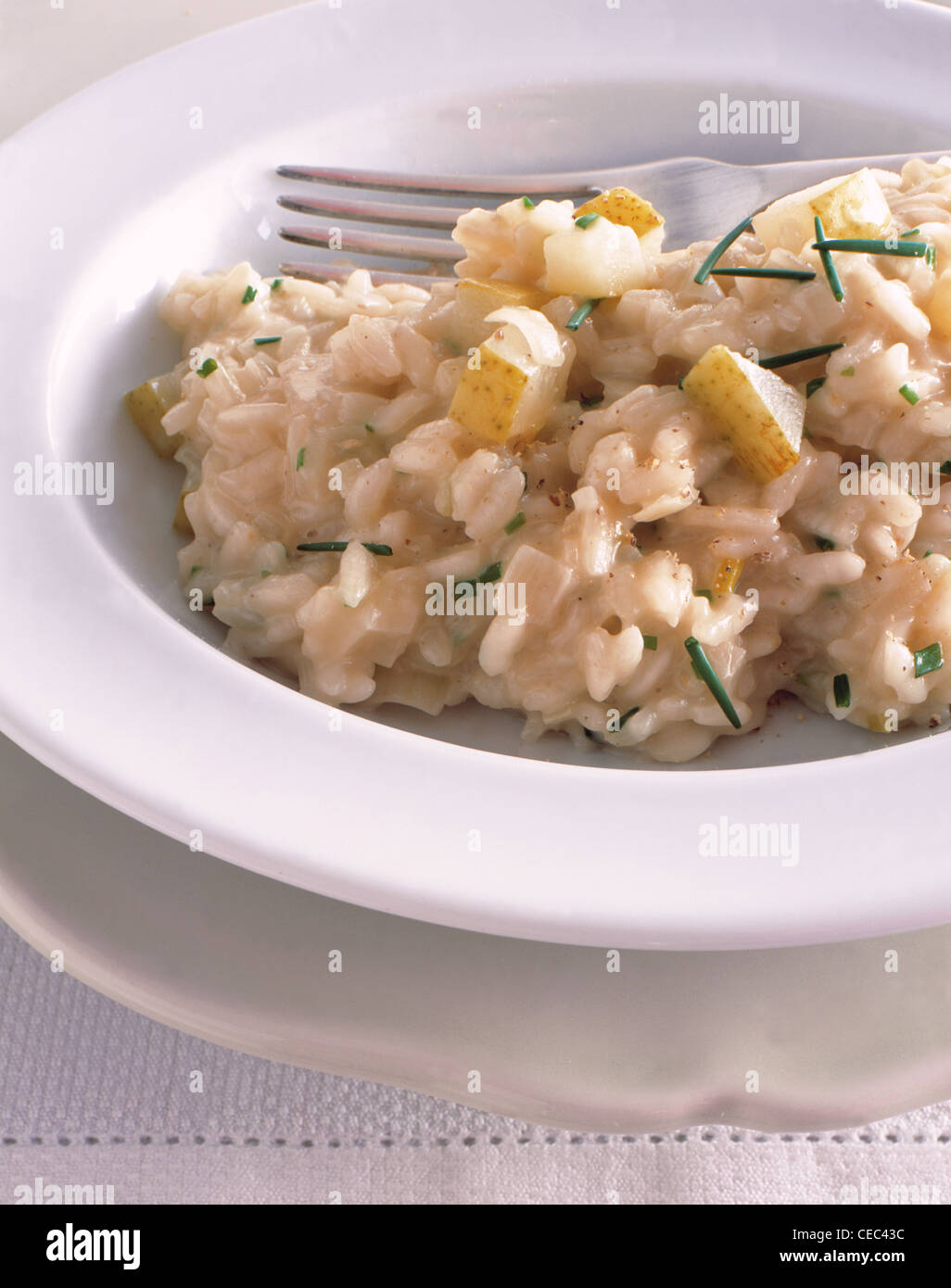 Three - cheese - risotto with pears Stock Photo - Alamy